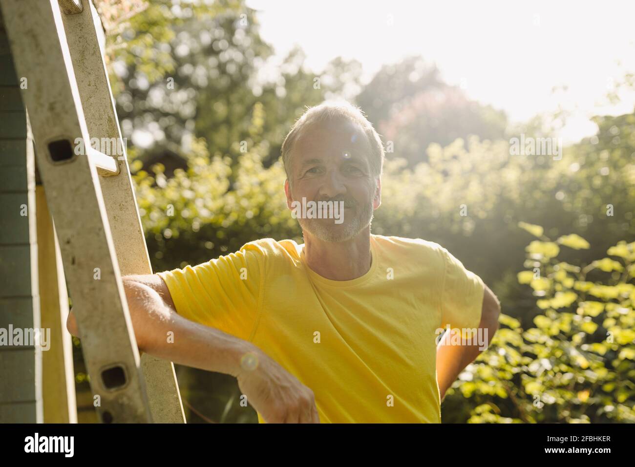 Man up ladder hi-res stock photography and images - Alamy
