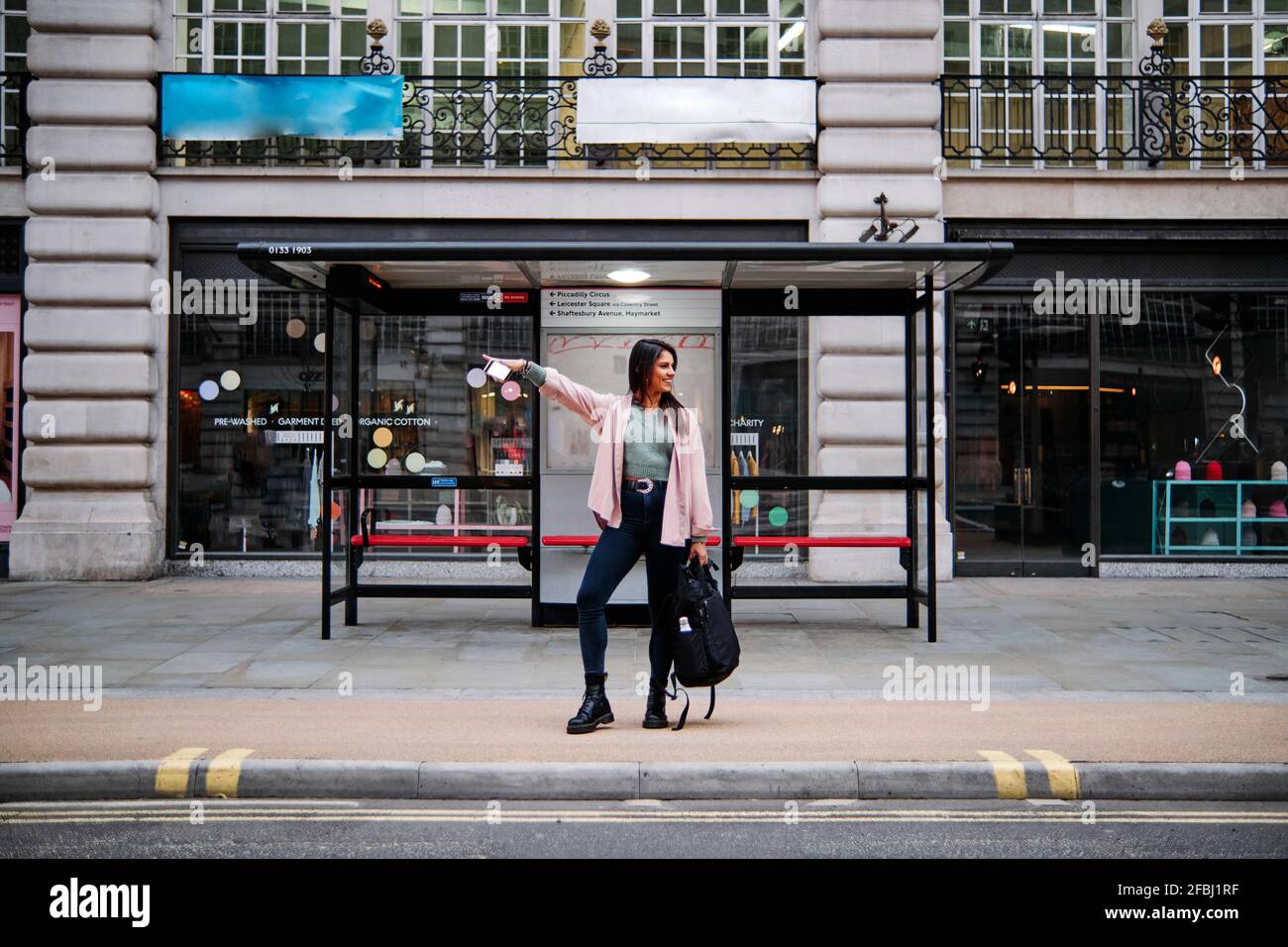 Woman waving bus hi-res stock photography and images - Alamy