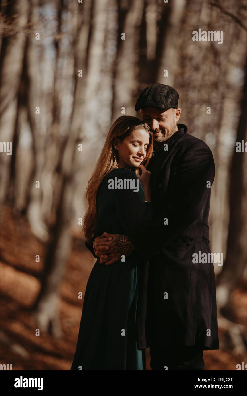 Couple dancing in forest during autumn Stock Photo - Alamy