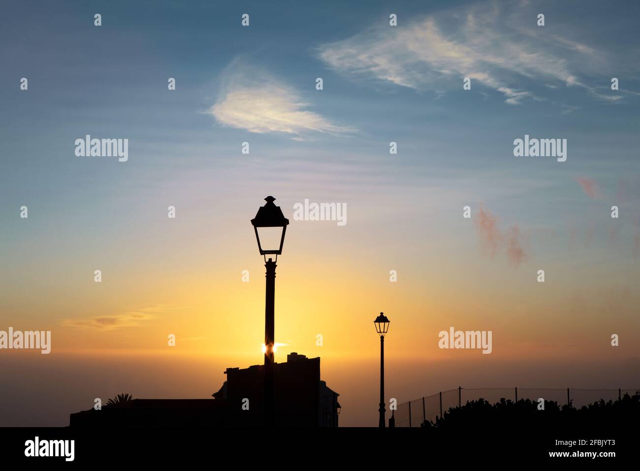 Silhouette street light sky sunset cloud sky hi-res stock photography ...
