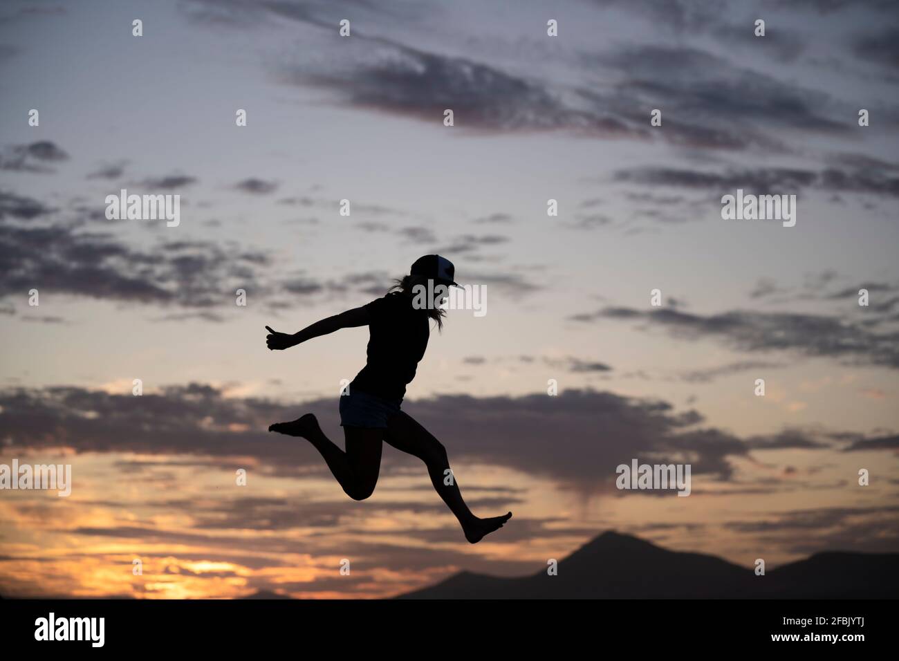Jumping sunset hi-res stock photography and images - Alamy
