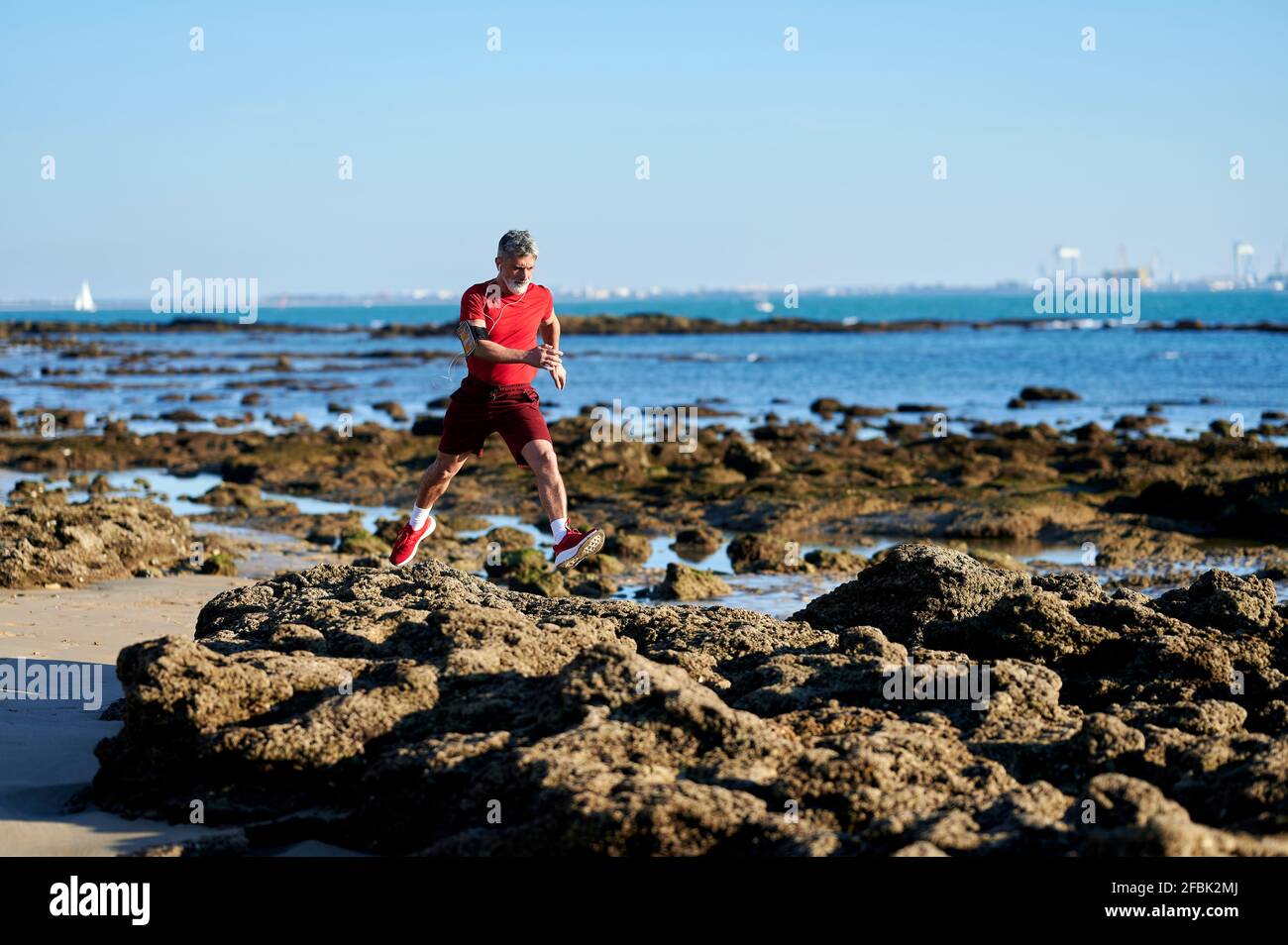 Jumping over rocks hi-res stock photography and images - Alamy