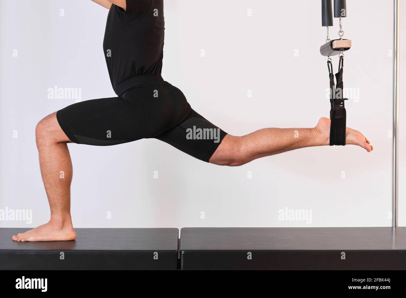 Man reformer pilates hi-res stock photography and images - Alamy