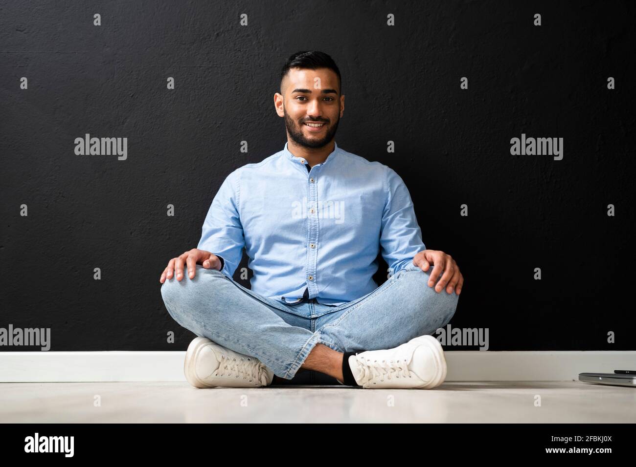 Cross legged black hi-res stock photography and images - Alamy