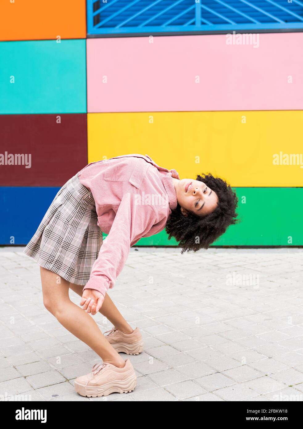 Female bending over hi-res stock photography and images - Alamy