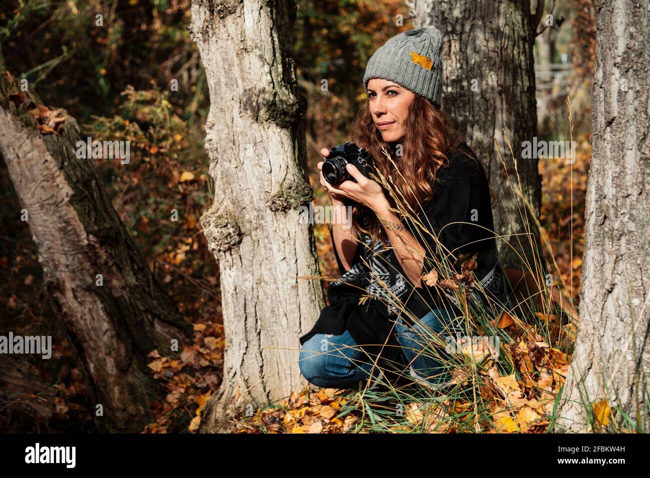Crouching looking to camera hi-res stock photography and images - Alamy