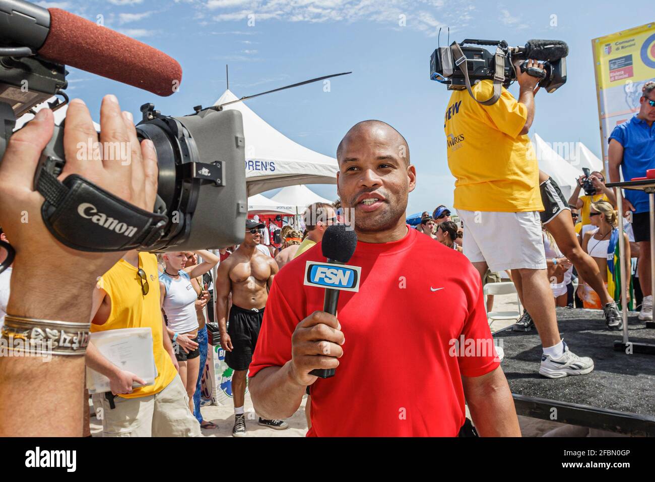 Black man male tv journalist reporter media holding microphone speaking ...