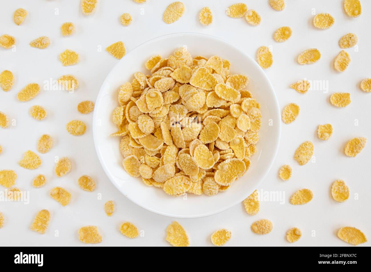 corn flake in bowl on white background, plate of cornflakes, healthy ...