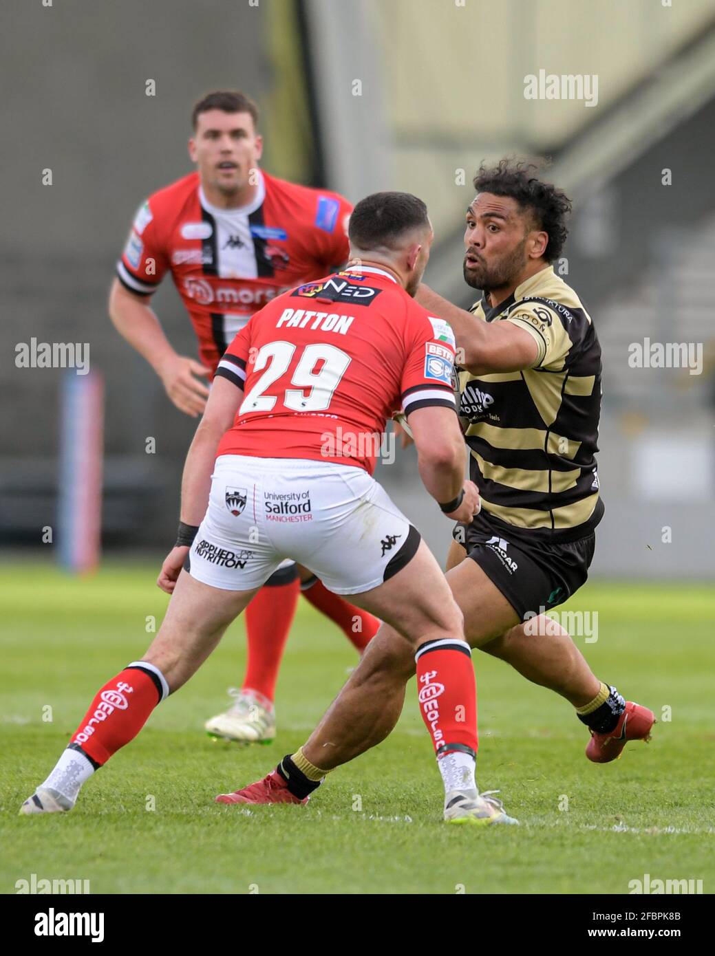 Mark Ioane (10) of Leigh Centurions looks for a way past Declan Patton ...