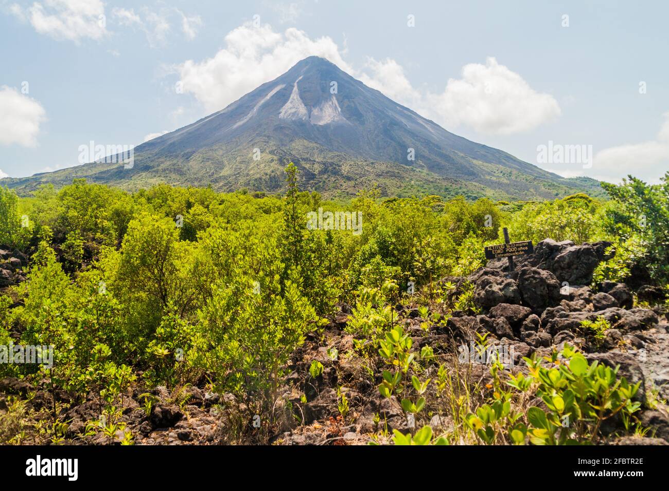 Volcano Arenal behind a lava field in National Park Arenal, Costa Rica ...