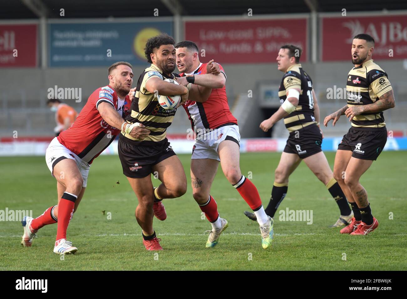 Mark Ioane (10) of Leigh Centurions in the tackle of Declan Patton (29 ...