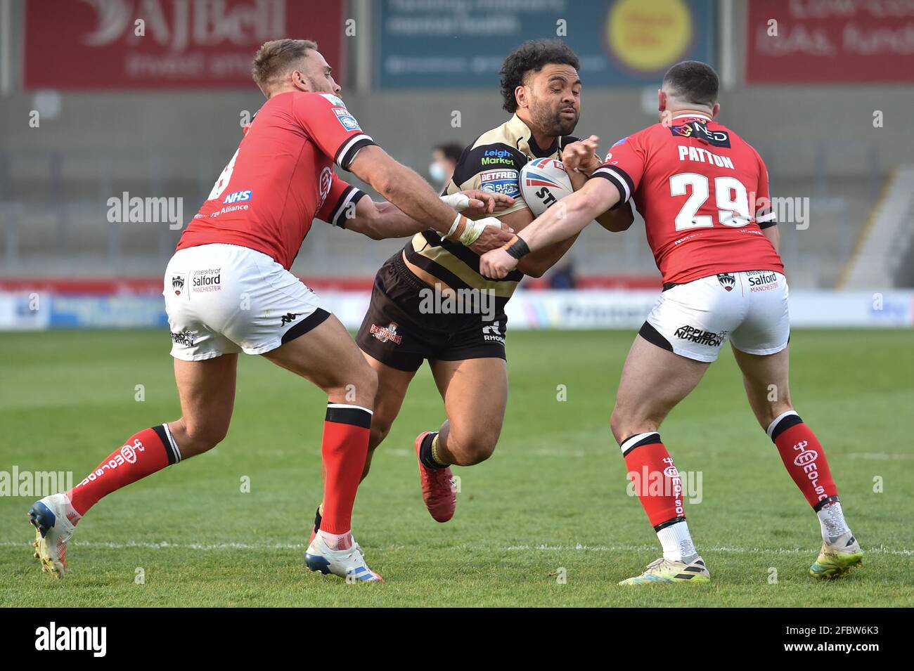 Mark Ioane (10) of Leigh Centurions in the tackle of Declan Patton (29 ...