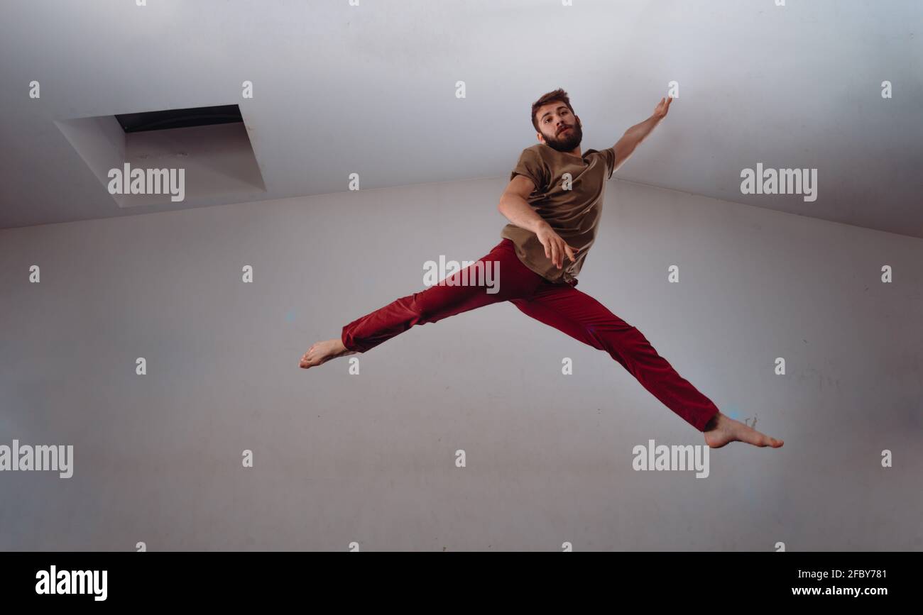 Slender flexible dance performer during a dance practice Stock Photo ...