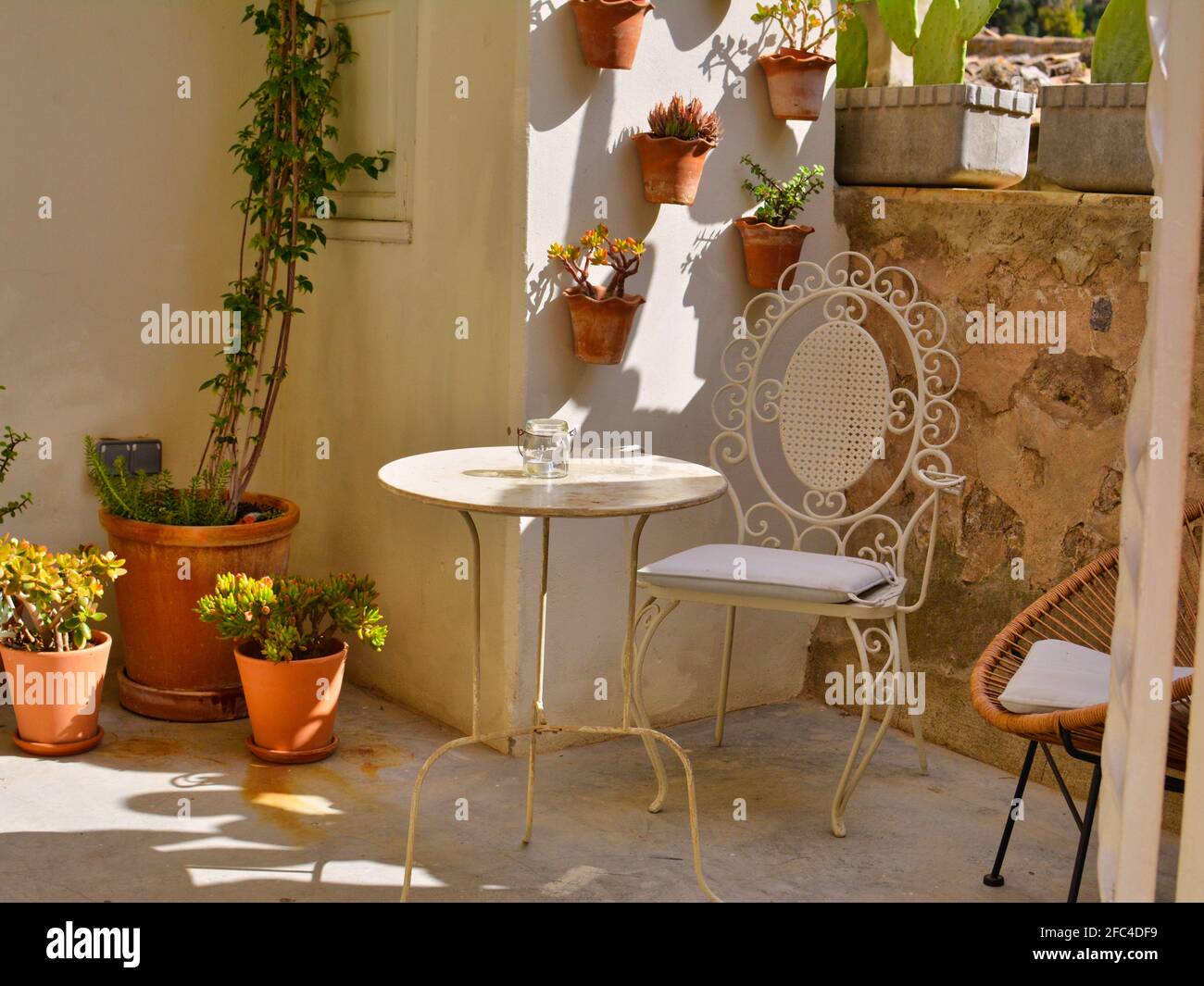 Terrace with old furniture Stock Photo - Alamy