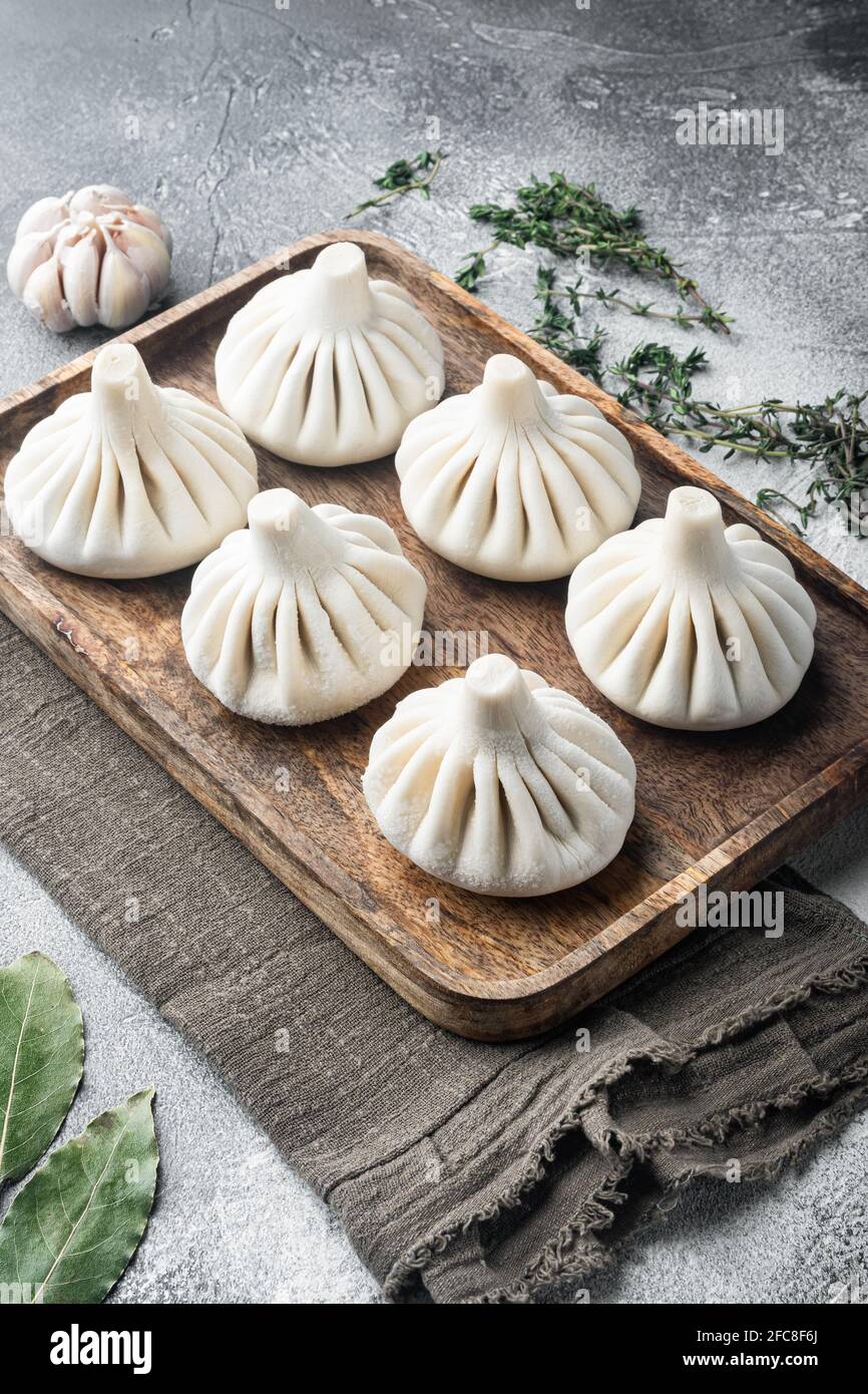 Khinkali, Georgian dumplings, traditional Georgian cuisine set, on gray ...