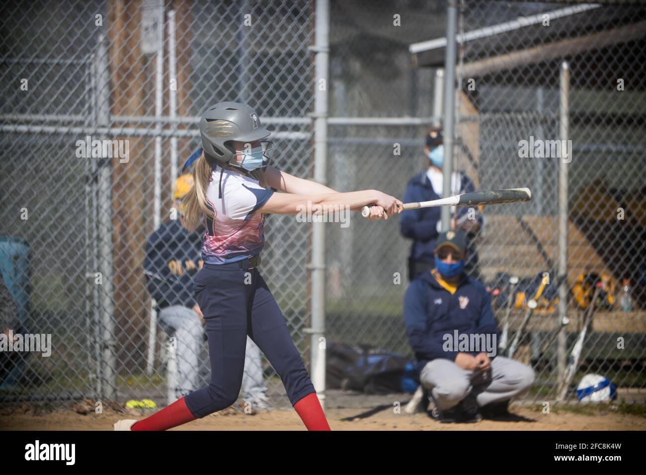 Softball in action hi-res stock photography and images - Alamy