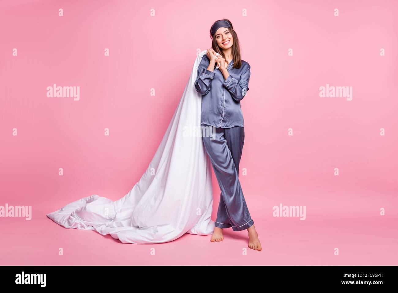 Full length photo portrait of girl pulling blanket isolated on pastel ...