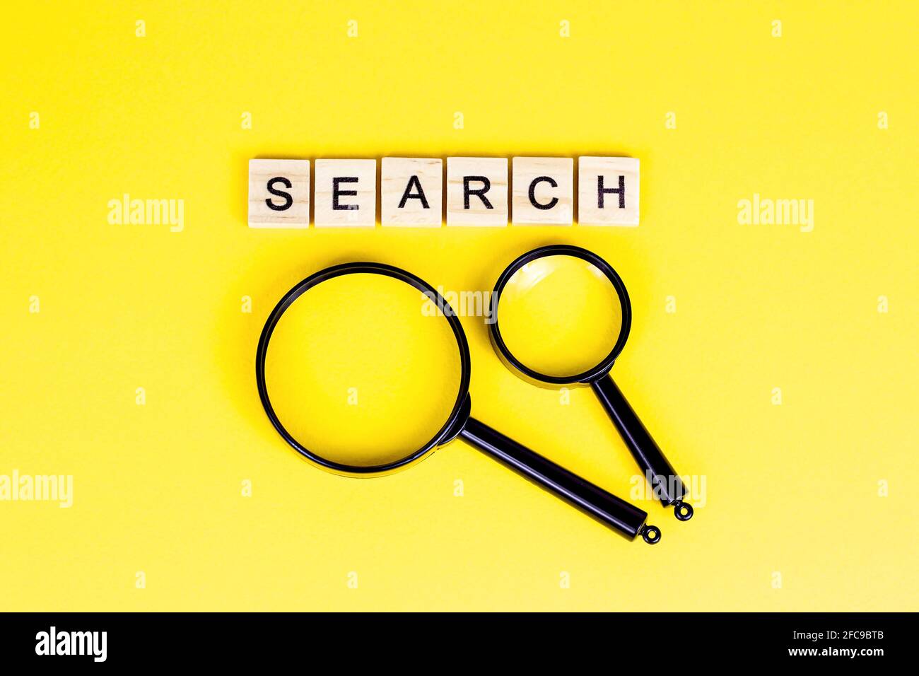 Word search with magnifying glass hi-res stock photography and images ...