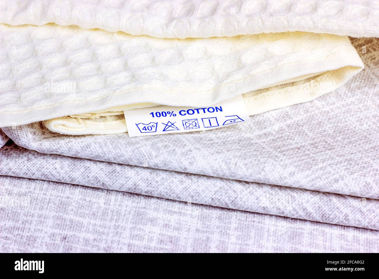 Pure natural light shades cotton fiber fabric with cloth label Stock ...