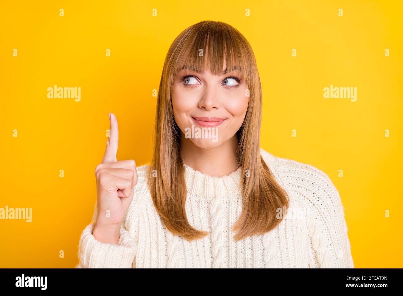 Photo of adorable person look indicate finger up empty space good mood ...