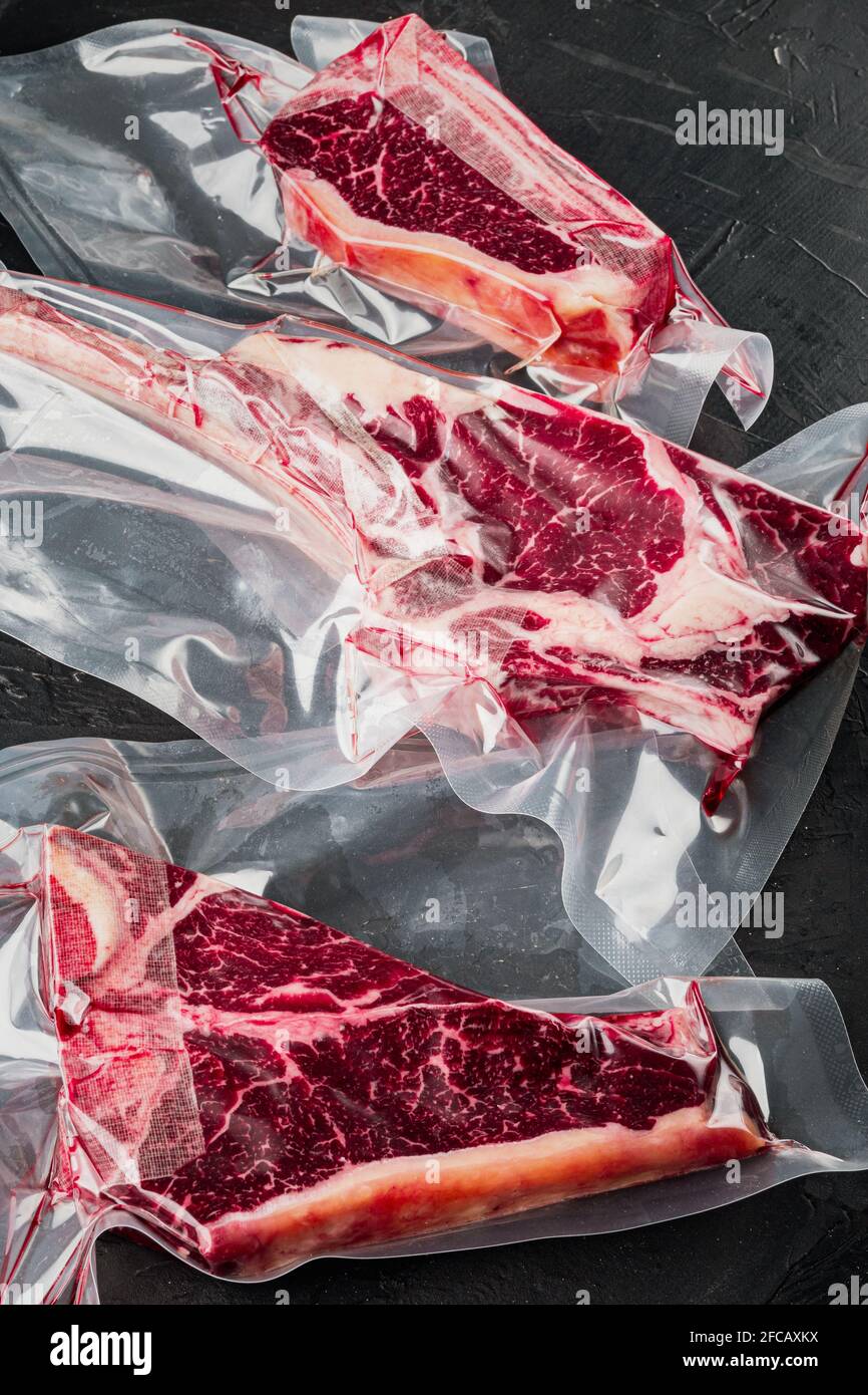 Dry aged steak in a vacuum marbled beef meat pack set, tomahawk, t bone ...