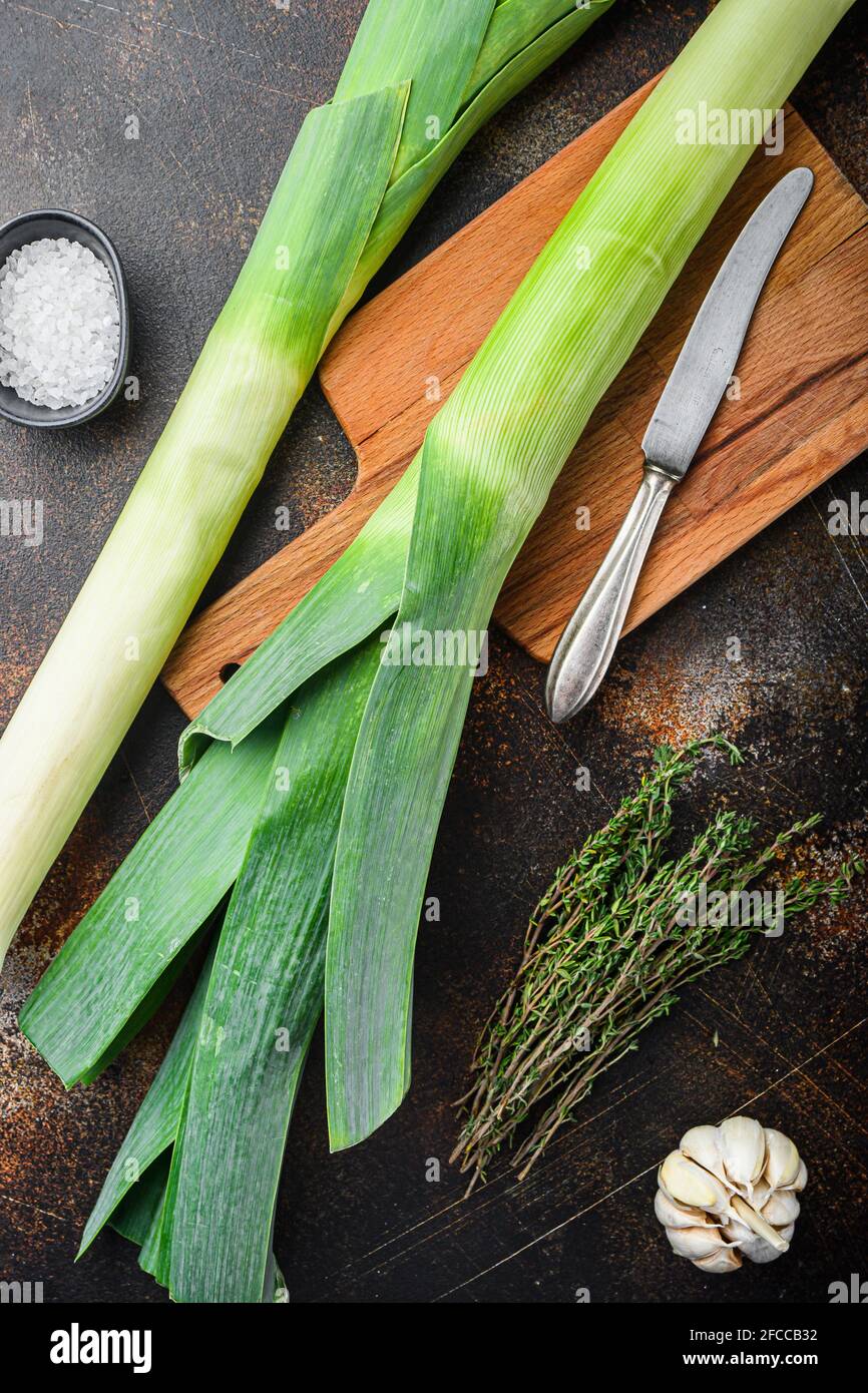 Organic leek stalks with herbs ingredients for cooking Braised Leeks ...