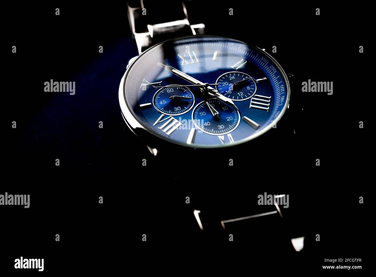 Isolated Blue Faced Chronograph Watch on Black Background Stock Photo ...