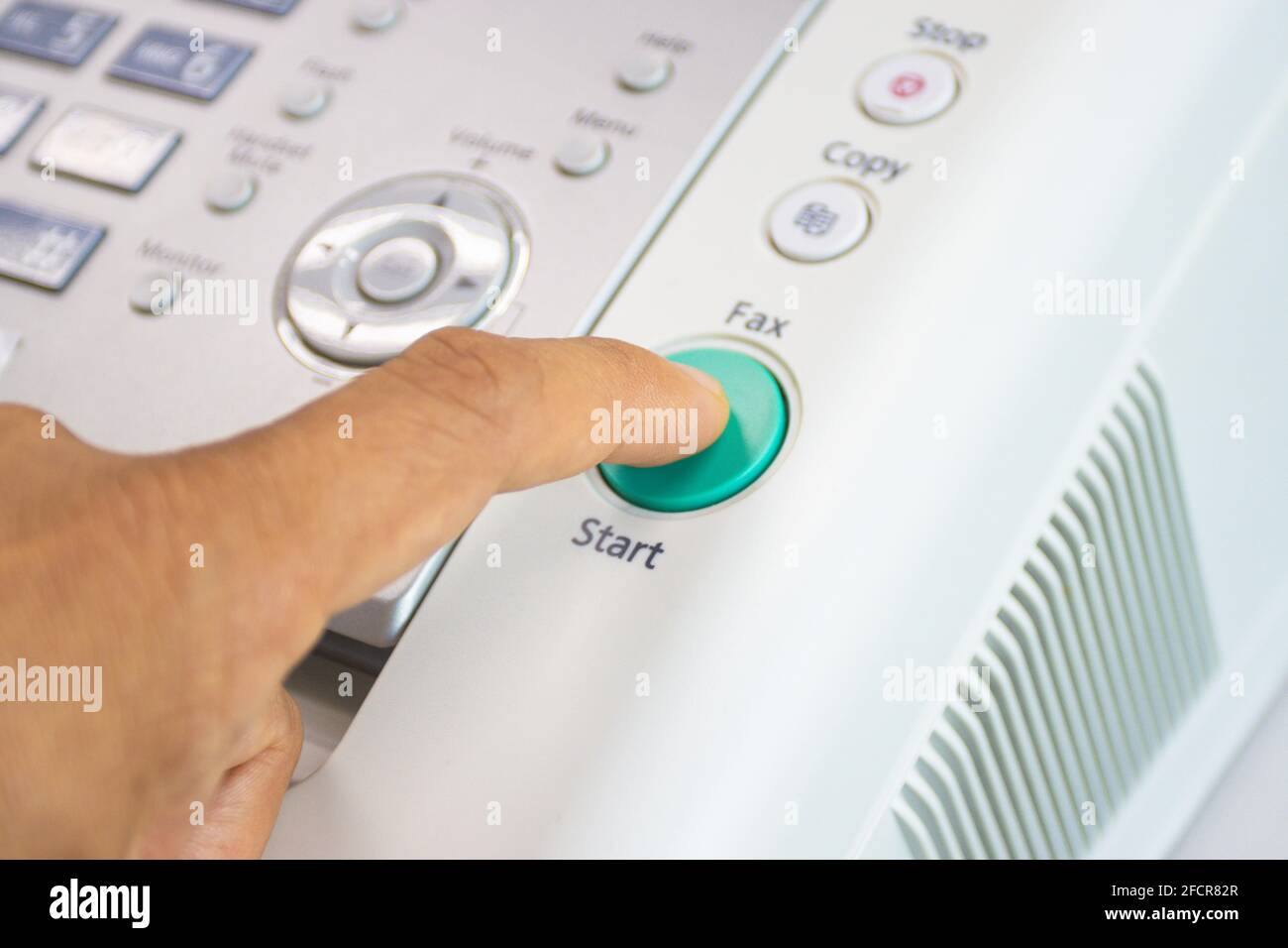 hand man are using a fax machine in the office, equipment for data ...