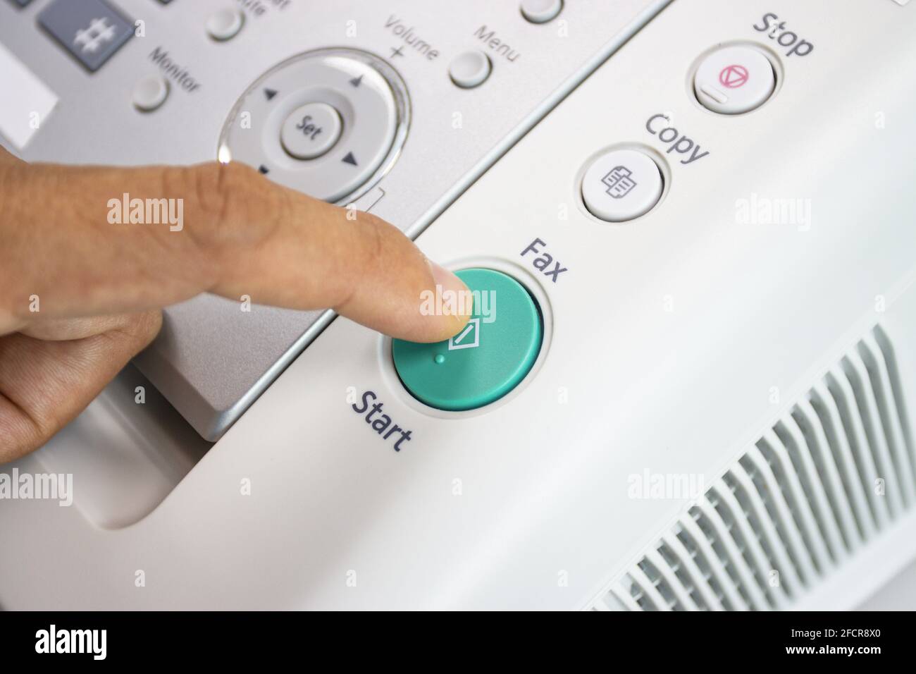 hand man are using a fax machine in the office, equipment for data ...