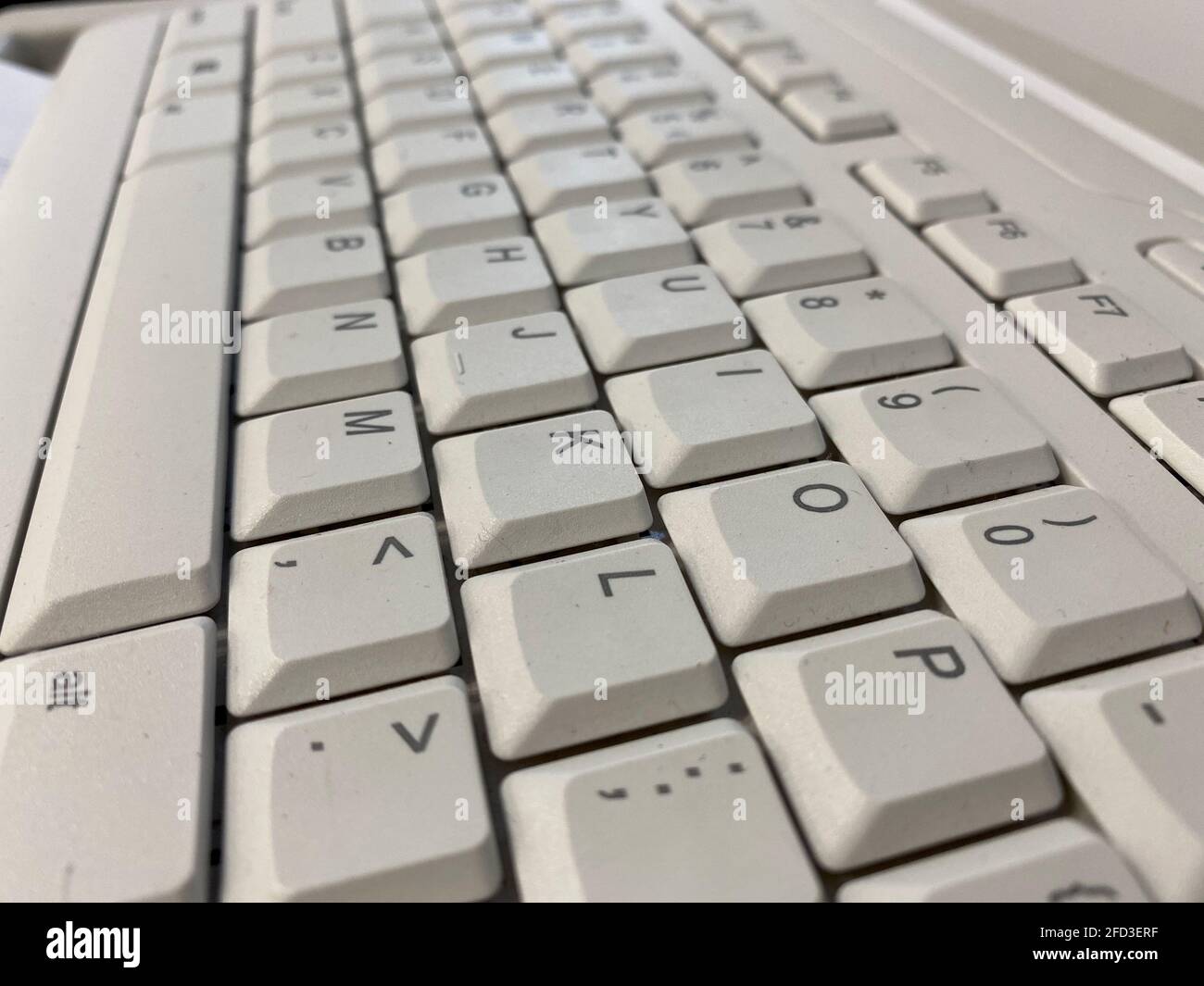 White keyboard closeup side view Stock Photo - Alamy