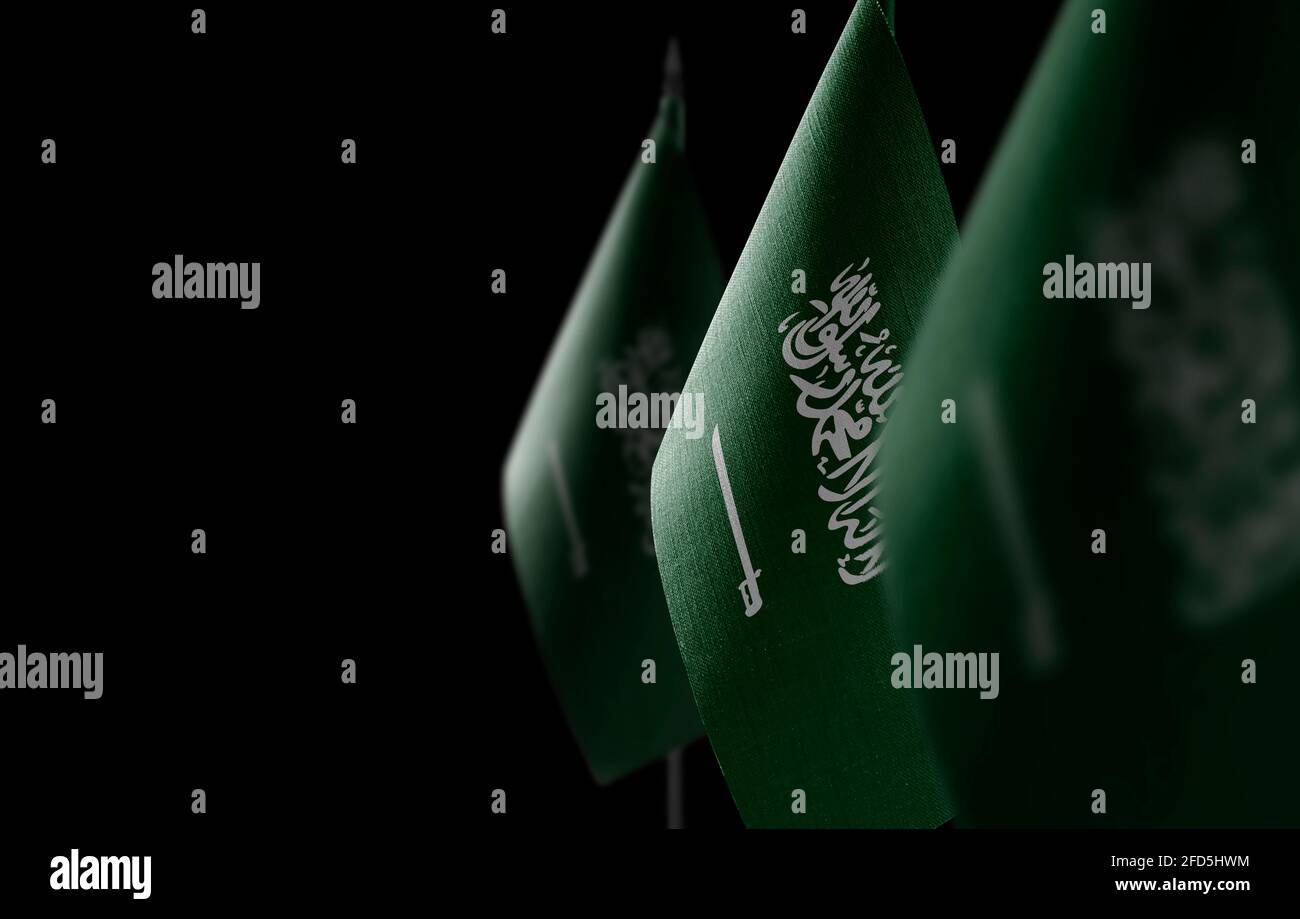 Small national flags of the Saudi Arabia on a black background Stock ...