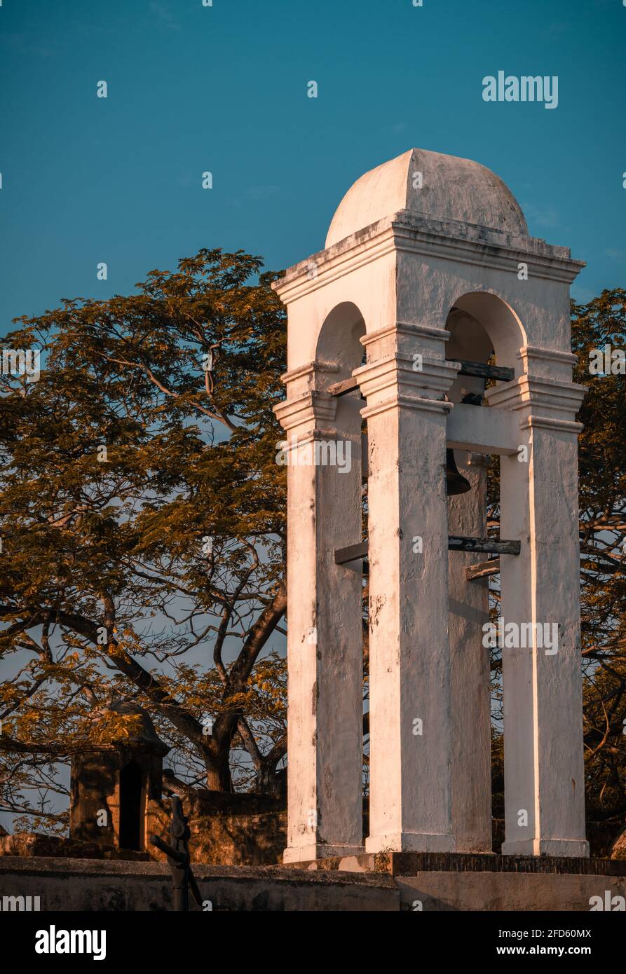 Tall white Bell tower at the maritime museum in Galle fort photograph ...