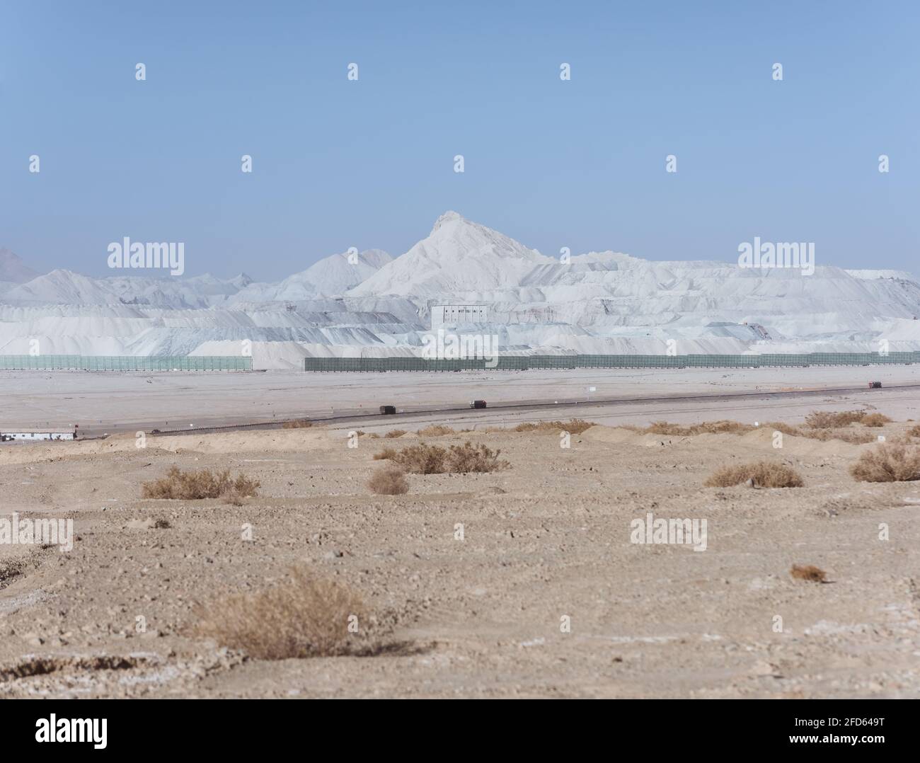 Open-air asbestos mining plant and steel frame fence Stock Photo - Alamy