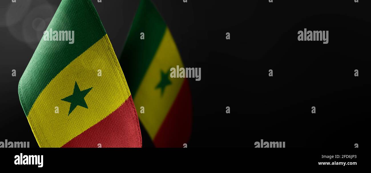 Small national flags of the Senegal on a dark background Stock Photo ...
