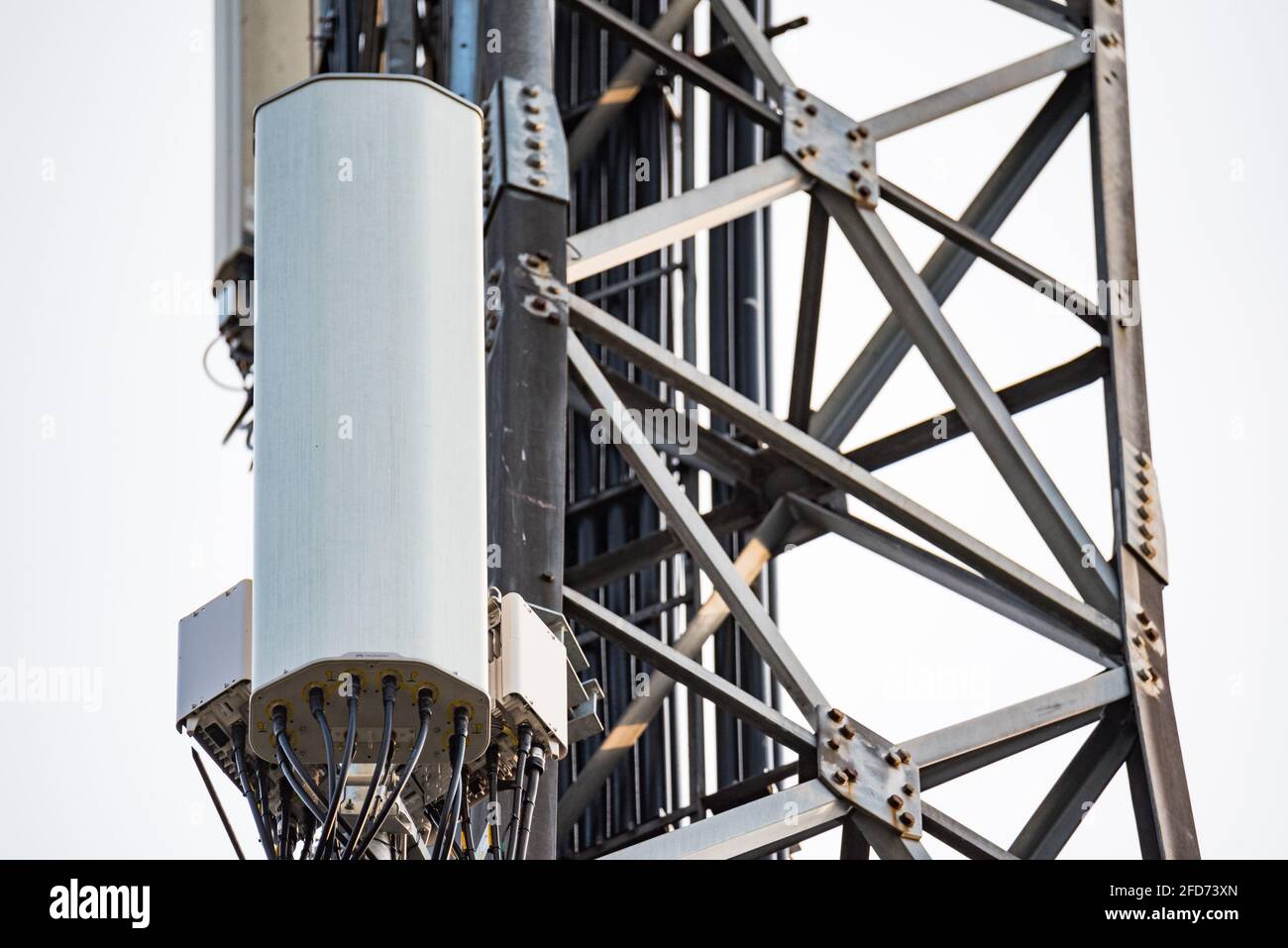 Mobile telephony base station. Metal mast structure with devices ...