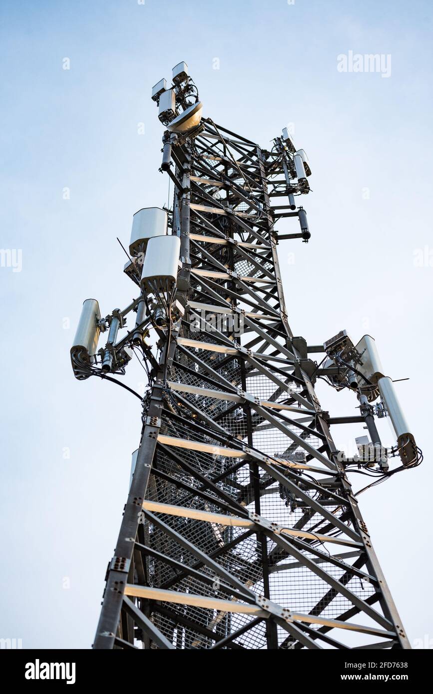 Mobile telephony base station. Metal mast structure with devices ...