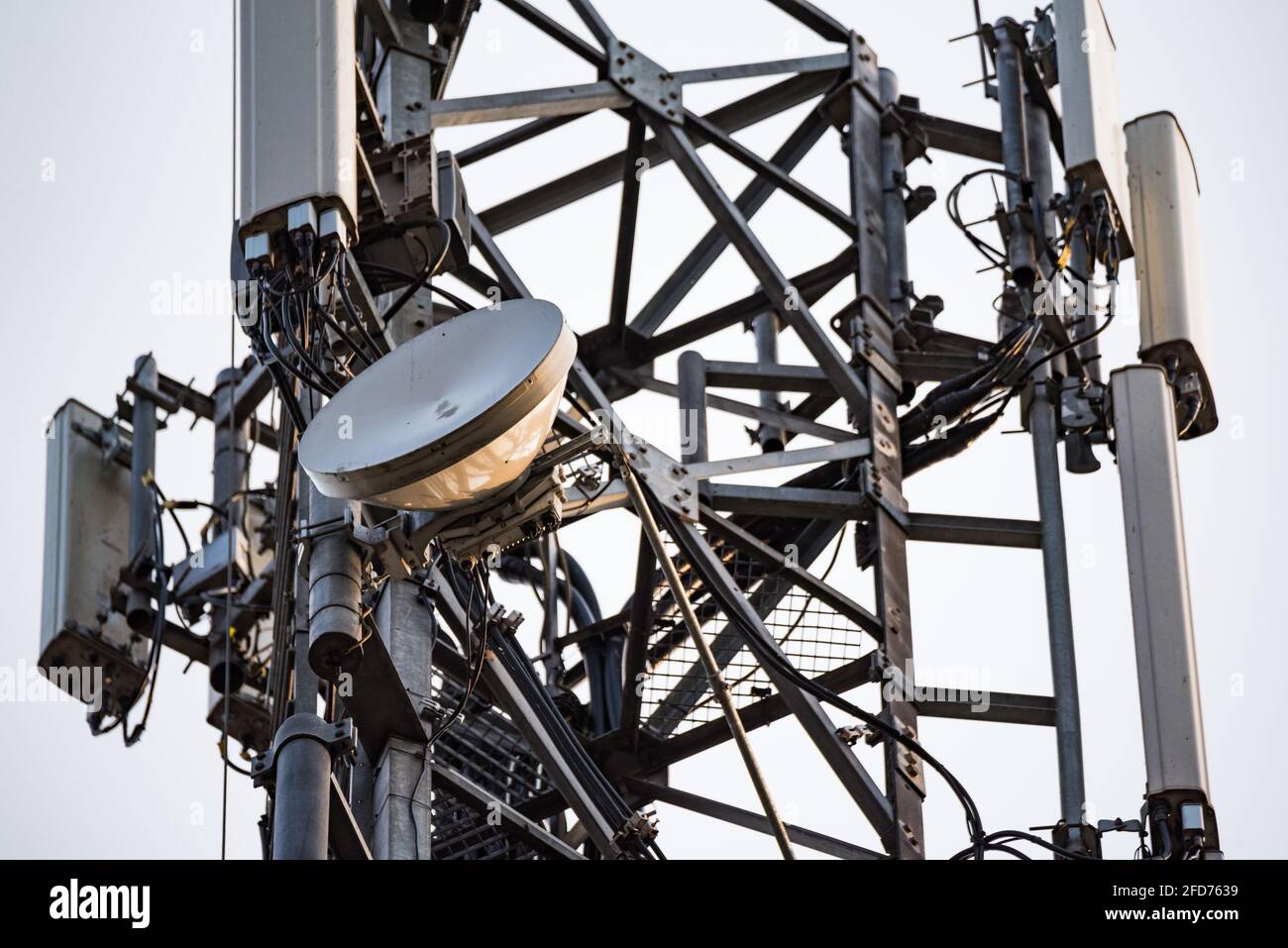 Mobile telephony base station. Metal mast structure with devices ...