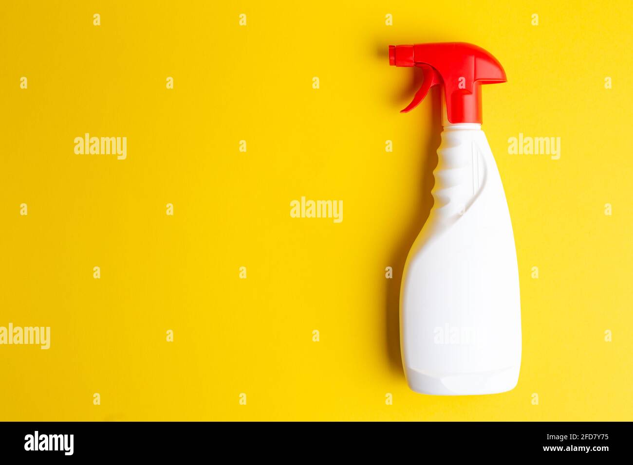 Bottle with detergents set on a yellow background. Means to maintain ...