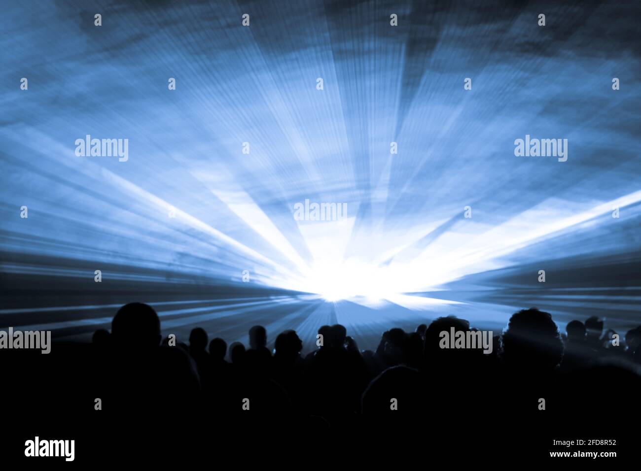 Blue laser show nightlife club stage with party people crowd. Luxury ...