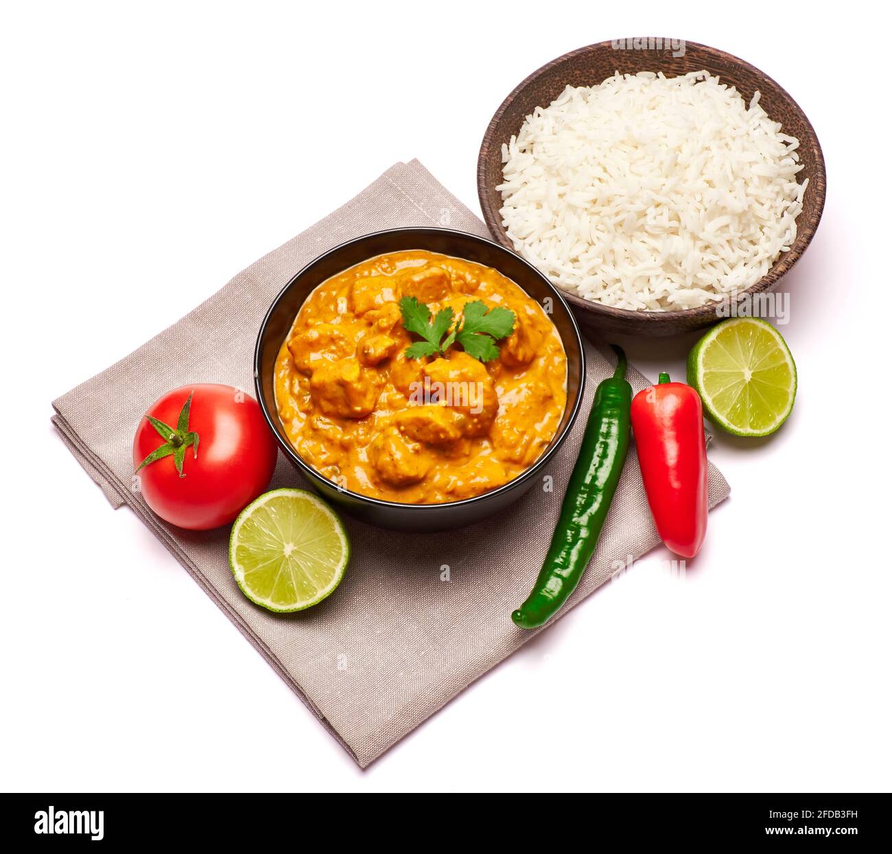 Traditional Chicken Curry and a bowl of boiled rice isolated on white ...