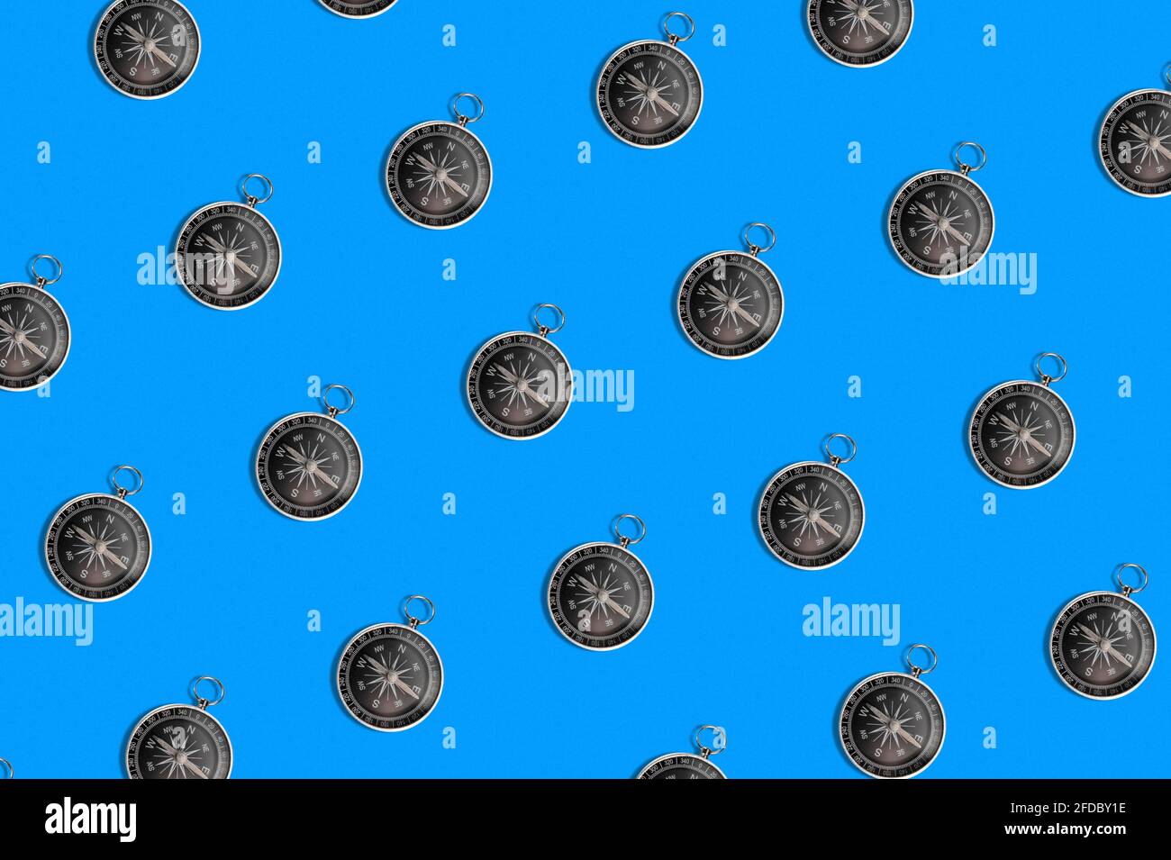 Pattern of compass. Trendy background of compass on a blue background ...