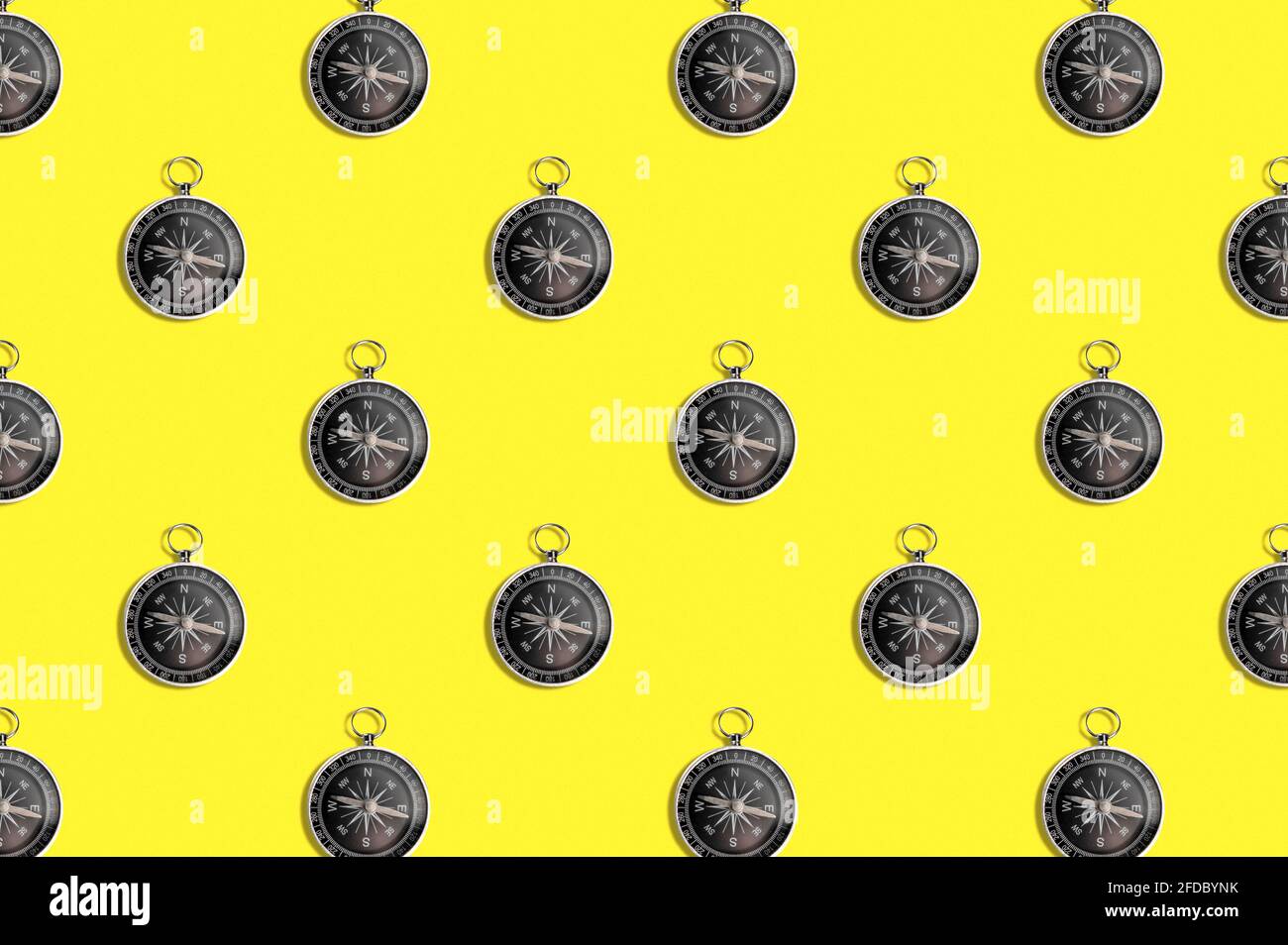 Pattern of compass. Trendy background of compass on a yellow background ...