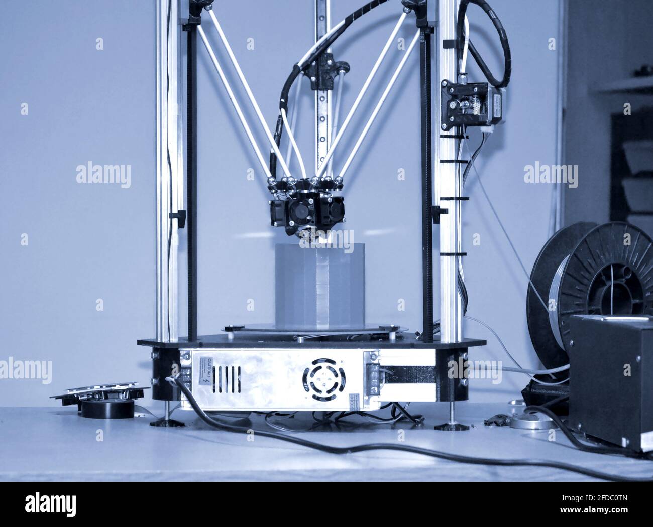 Modern 3D printer printing figure close-up. Automatic three dimensiona ...