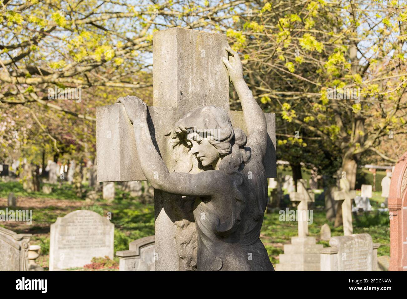 Closeup of female funerary sculpture in North Sheen Cemetery, Mortlake ...