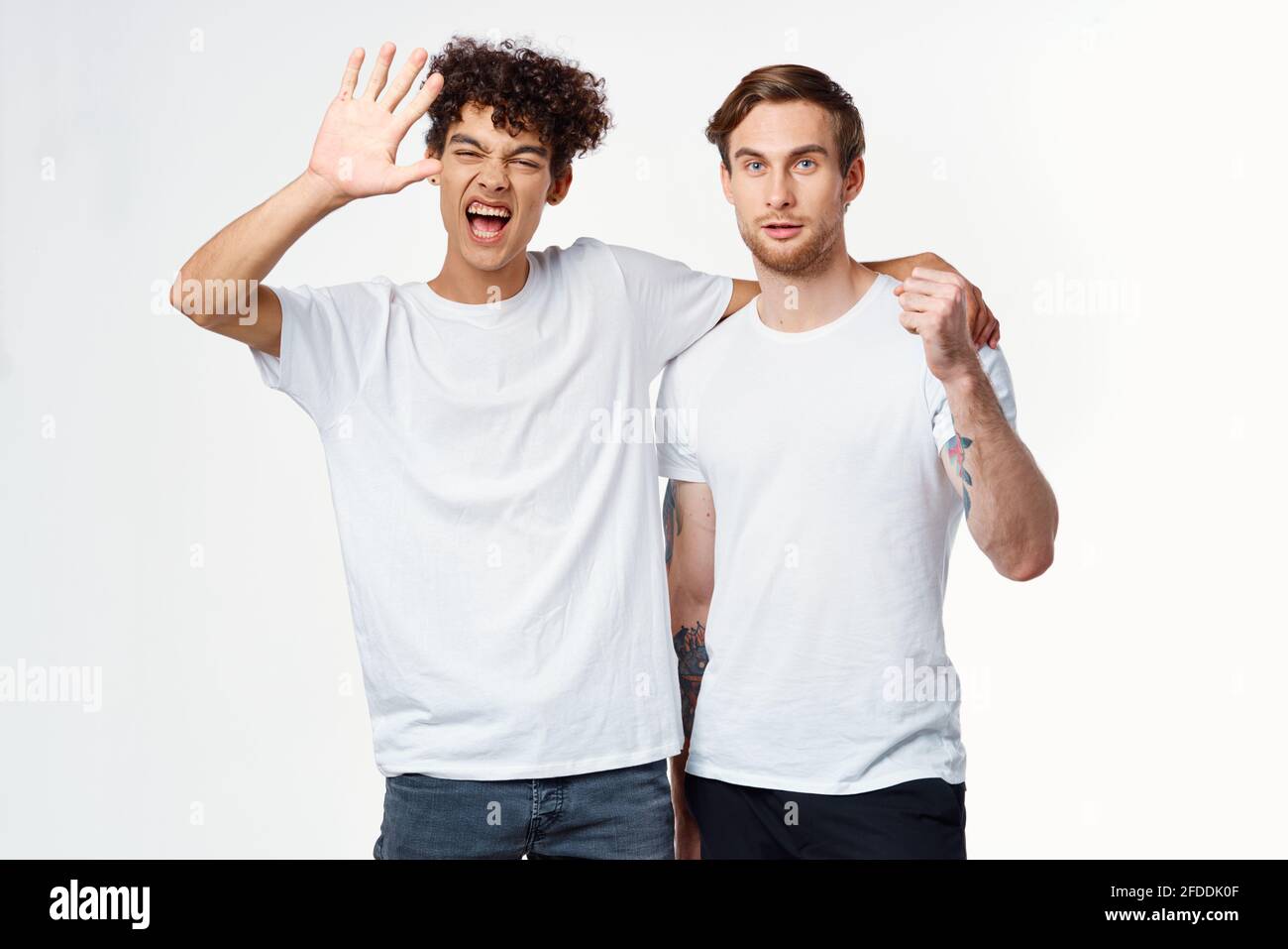 Portrait two brothers standing back hi-res stock photography and images ...