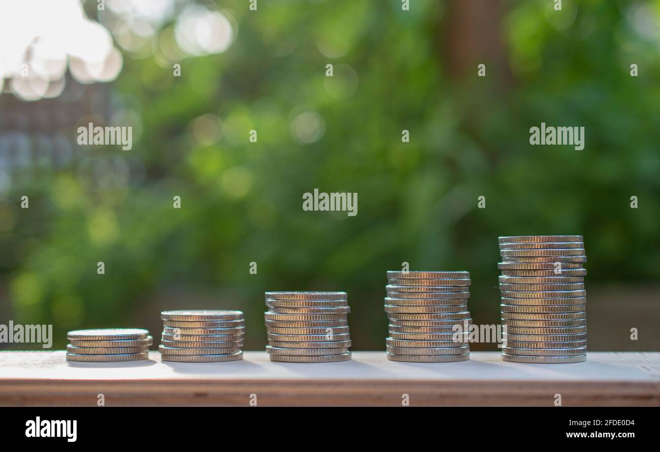 Growing stacks of coins as representation of growing wealth ...