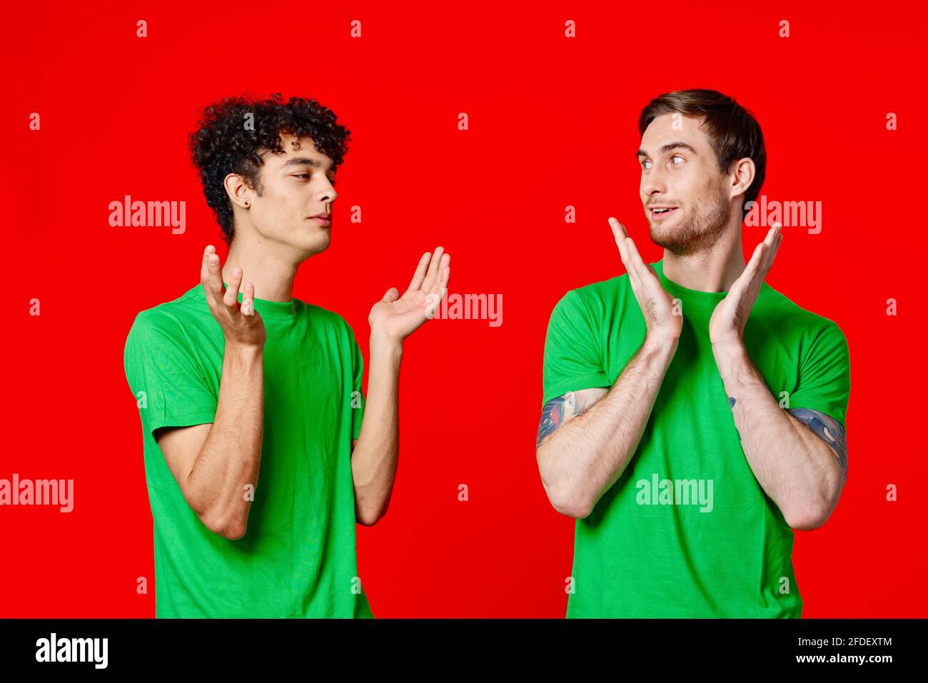 Two heads together men hi-res stock photography and images - Alamy