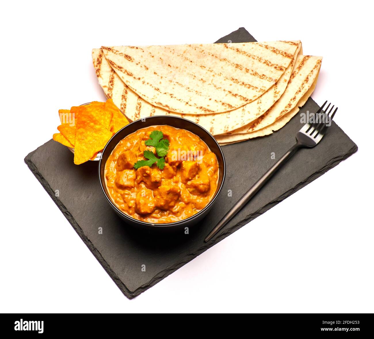 Plate of Traditional Chicken Curry on stone serving board isolated on ...