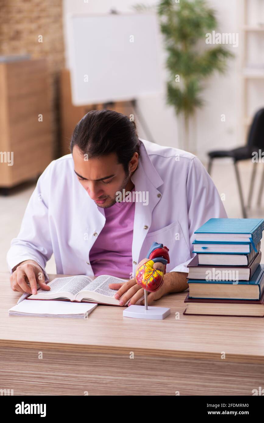 Young doctor student cardiologist sitting in the classroom Stock Photo ...