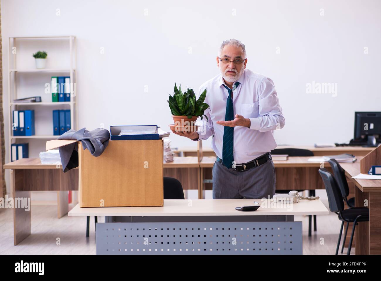 Old employee being fired from his work Stock Photo - Alamy